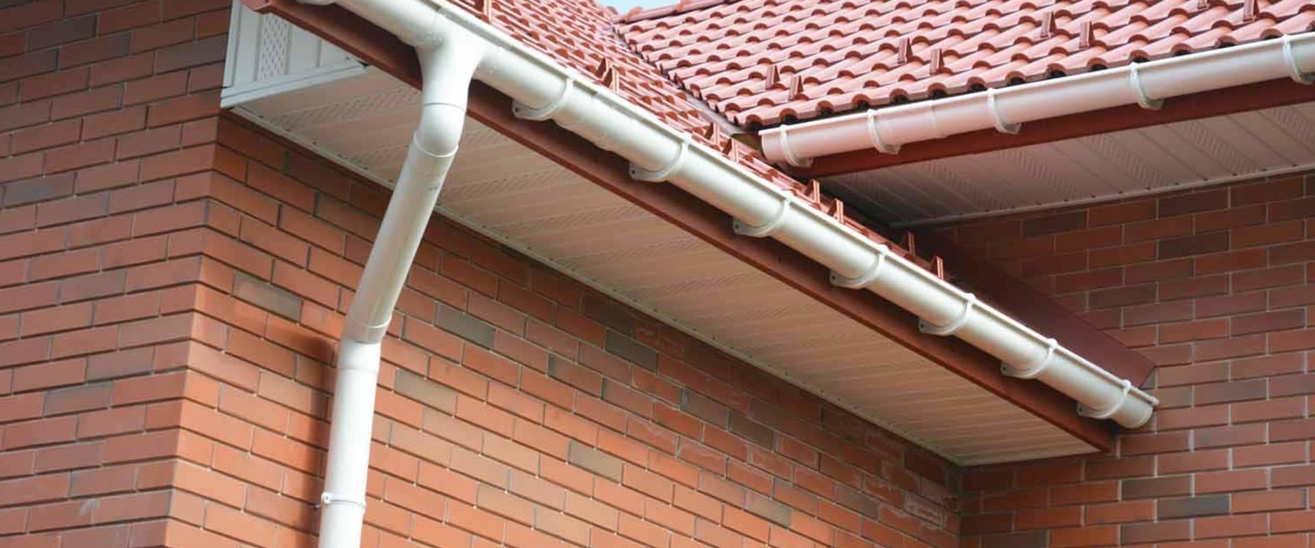 What is the proper placement of rain gutters?